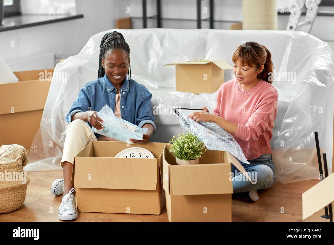 Unpacking wrap hi-res stock photography and images - Alamy