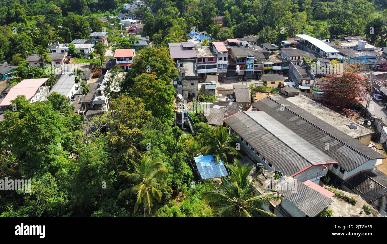 An aerial view. of houses and rural buildings in a small town on a ...