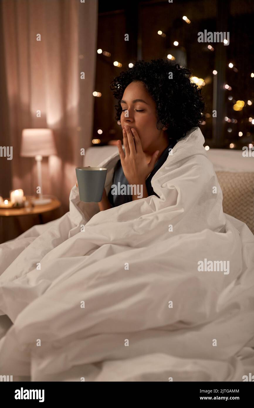 Tired woman coffee bed hi-res stock photography and images - Alamy