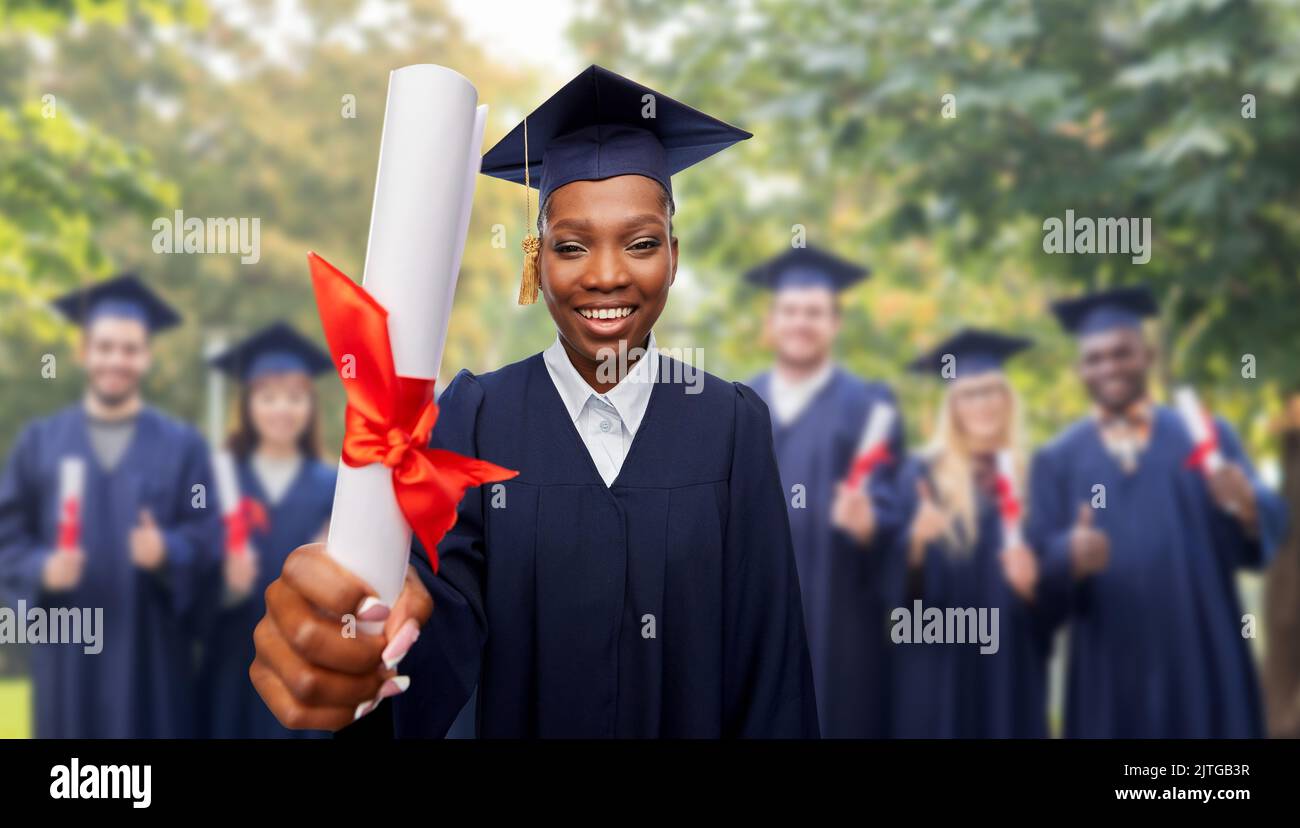 happy female graduate student with diploma Stock Photo - Alamy