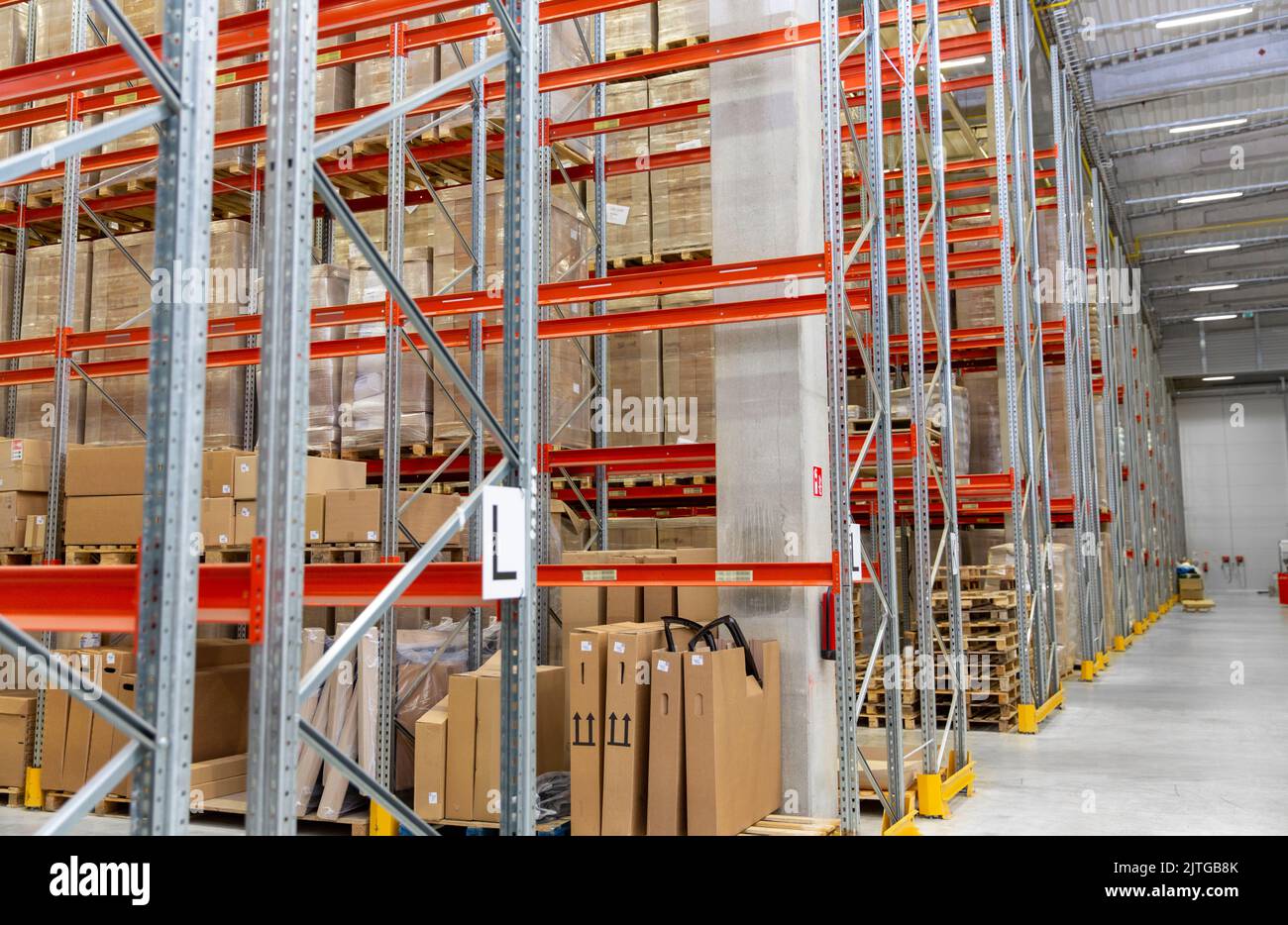 cargo storing at warehouse shelves Stock Photo - Alamy