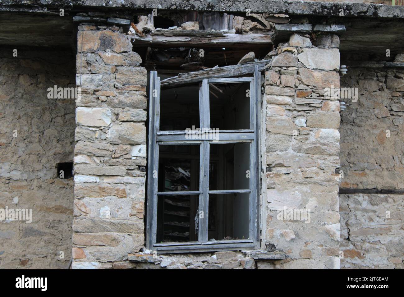 A broken old window of an abandoned house Stock Photo - Alamy