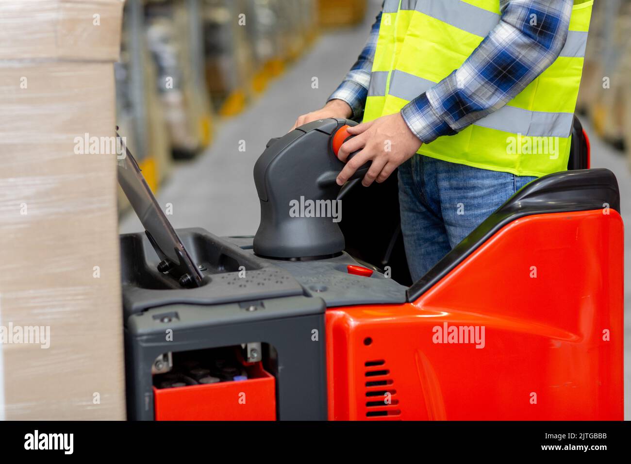 man operating forklift loader at warehouse Stock Photo - Alamy