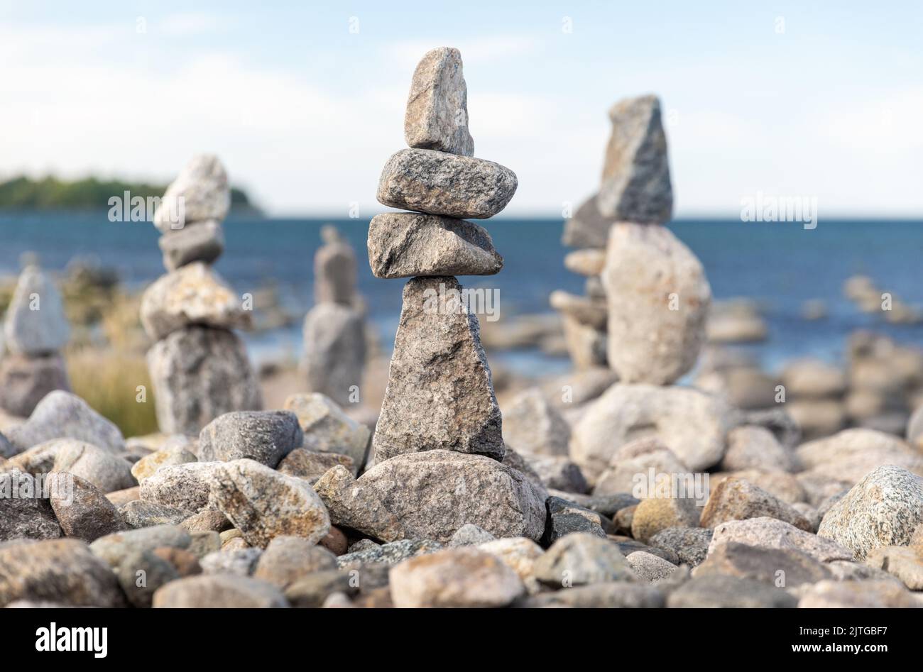 close up of stone pyramids or towers on beach Stock Photo - Alamy