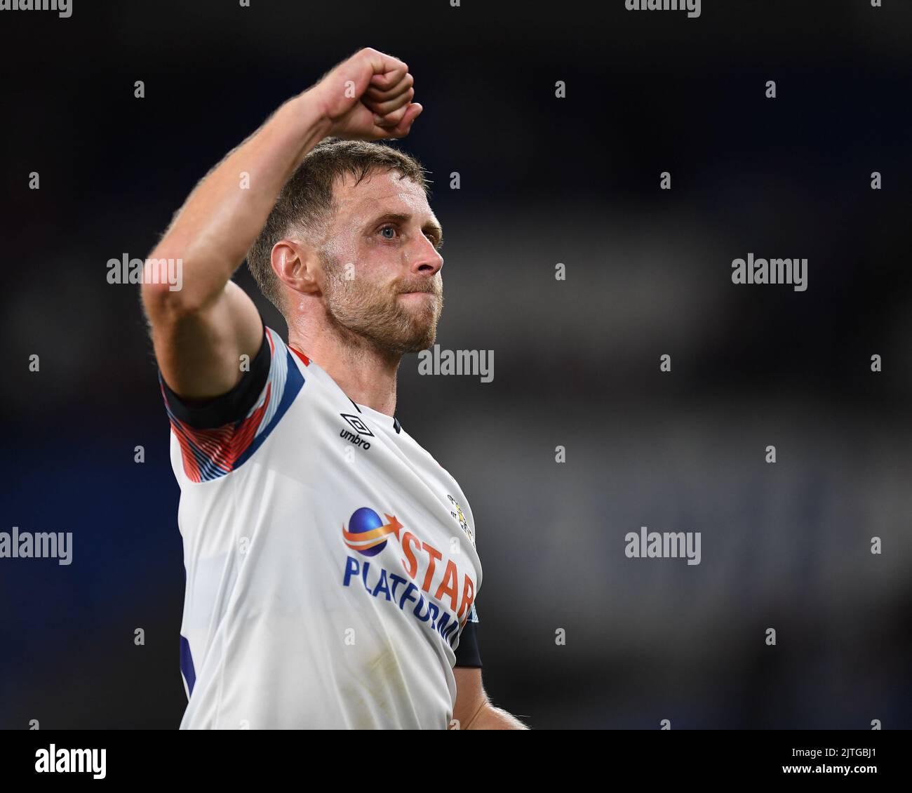 Jordan Clark #18 of Luton Town salutes the travelling supporters Stock ...