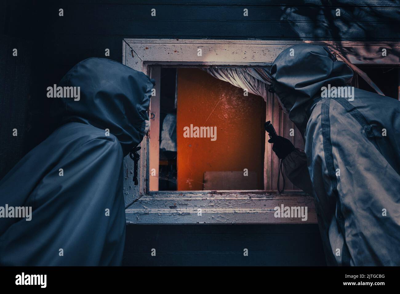 Fictional movie poster. People with flashlights, masks and protective ...