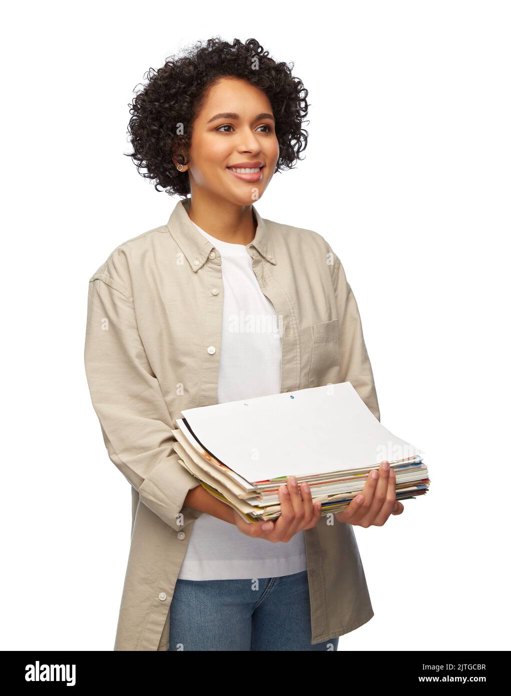 smiling woman with magazines sorting paper waste Stock Photo - Alamy