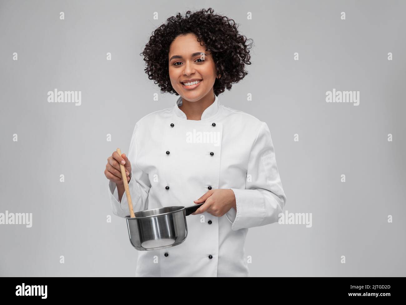 happy smiling female chef with saucepan Stock Photo - Alamy