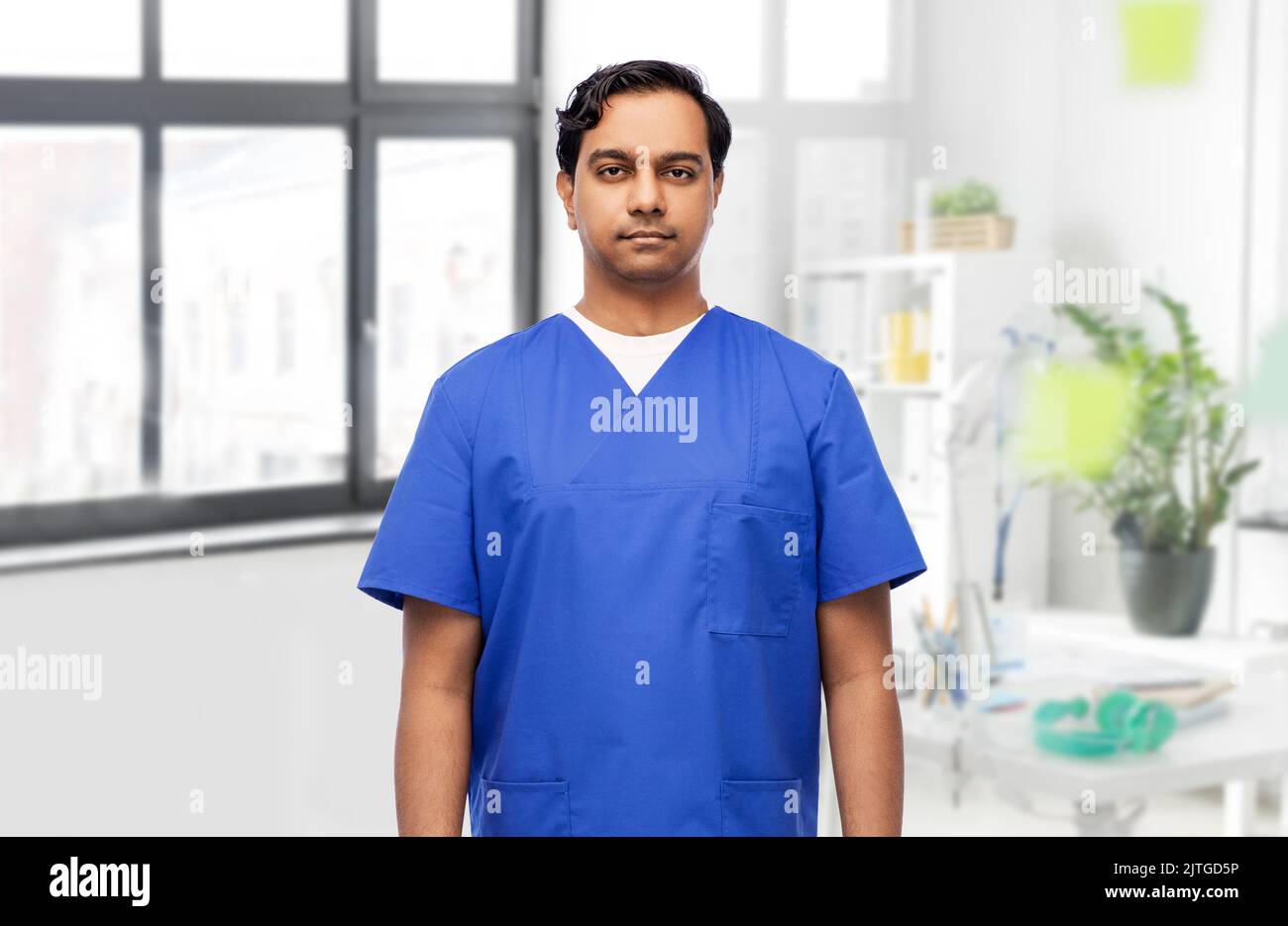 Medical nurse in blue uniform hi-res stock photography and images - Alamy