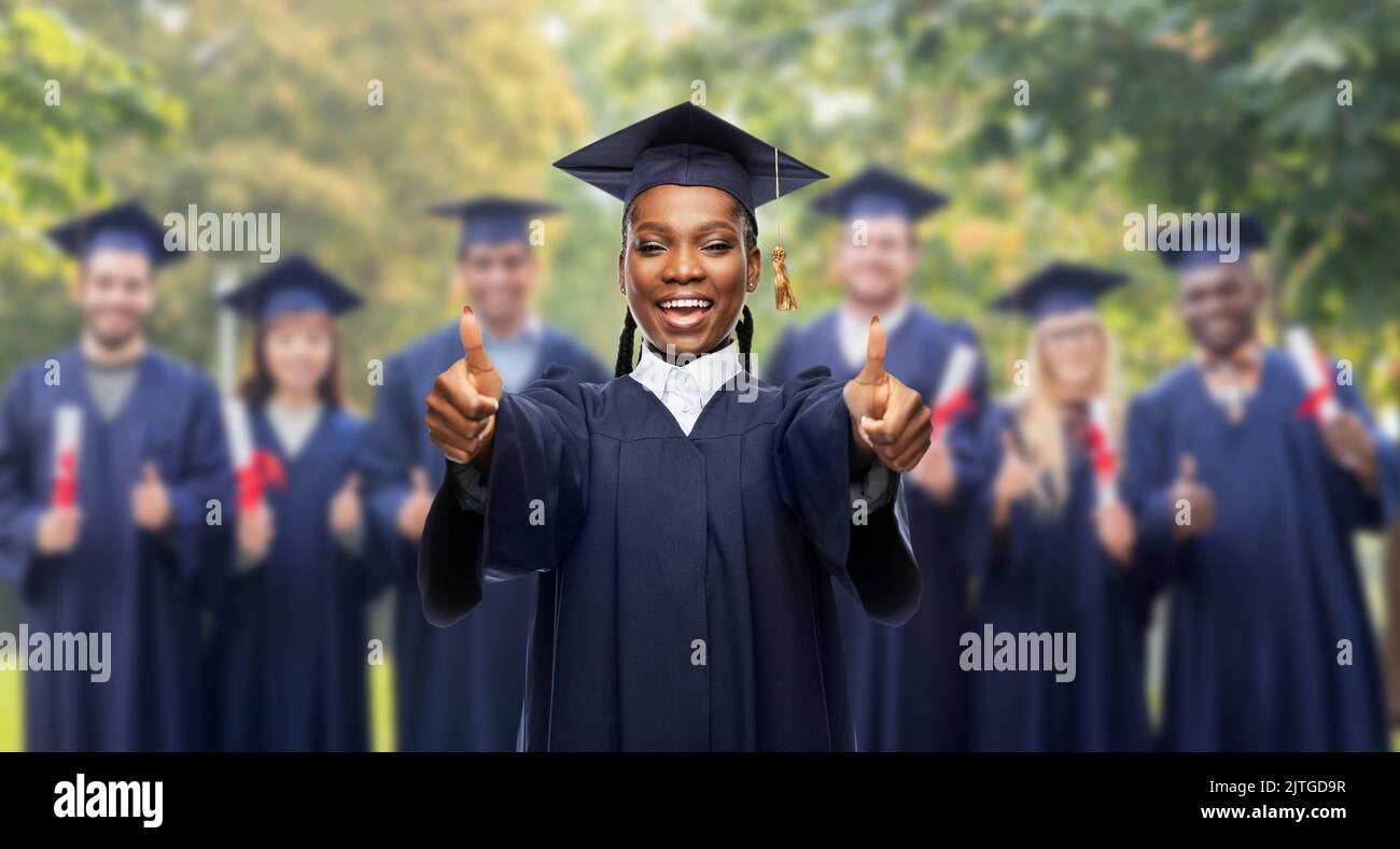 happy female graduate student in mortarboard Stock Photo - Alamy