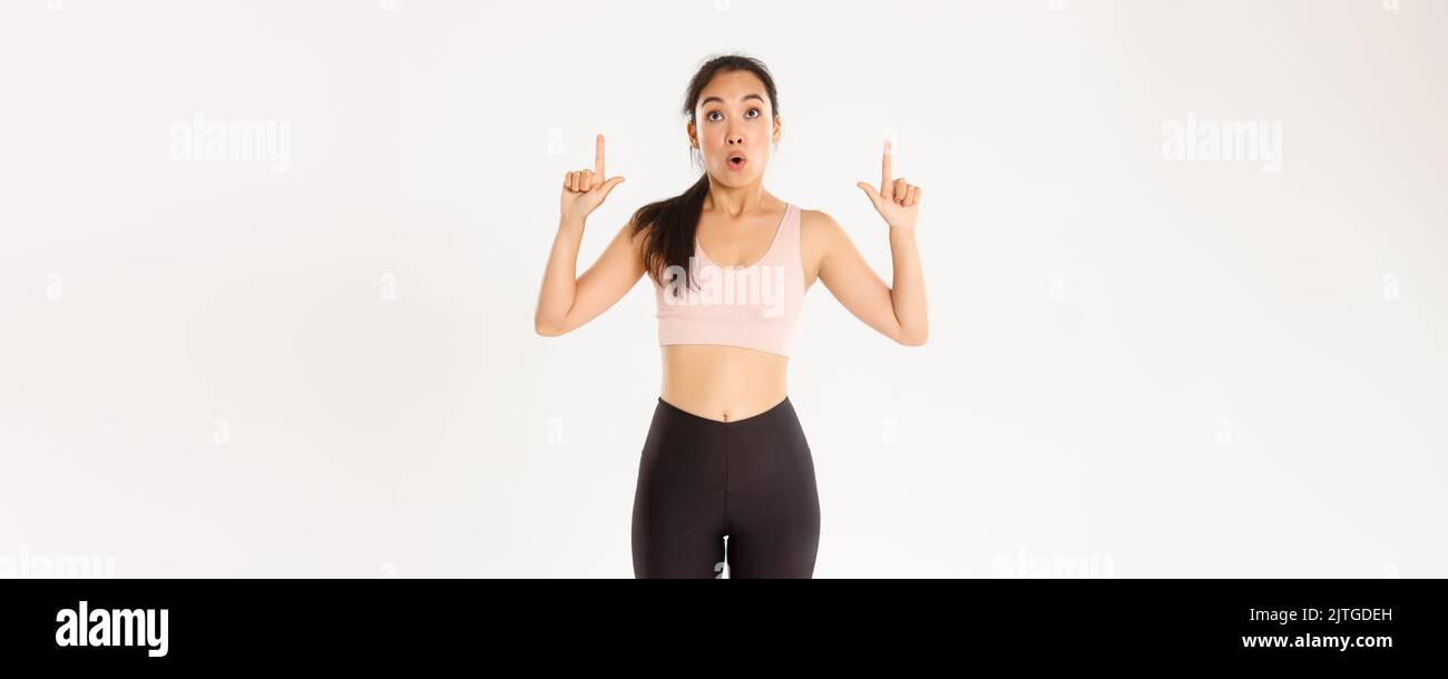 Sport, wellbeing and active lifestyle concept. Excited and happy asian ...