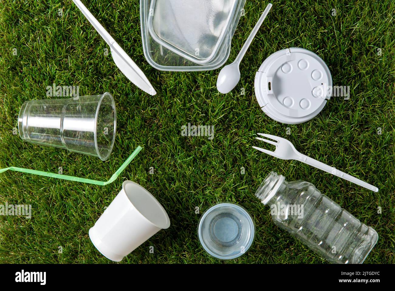 close up of plastic waste on grass Stock Photo - Alamy