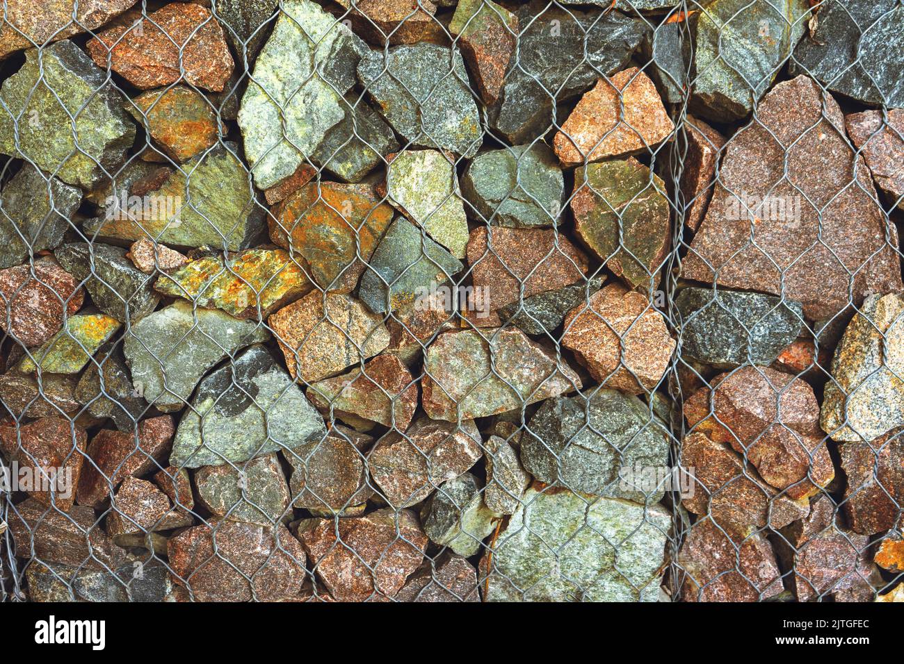 Gabion, texture, background. Wall made of natural rocks and metal ...