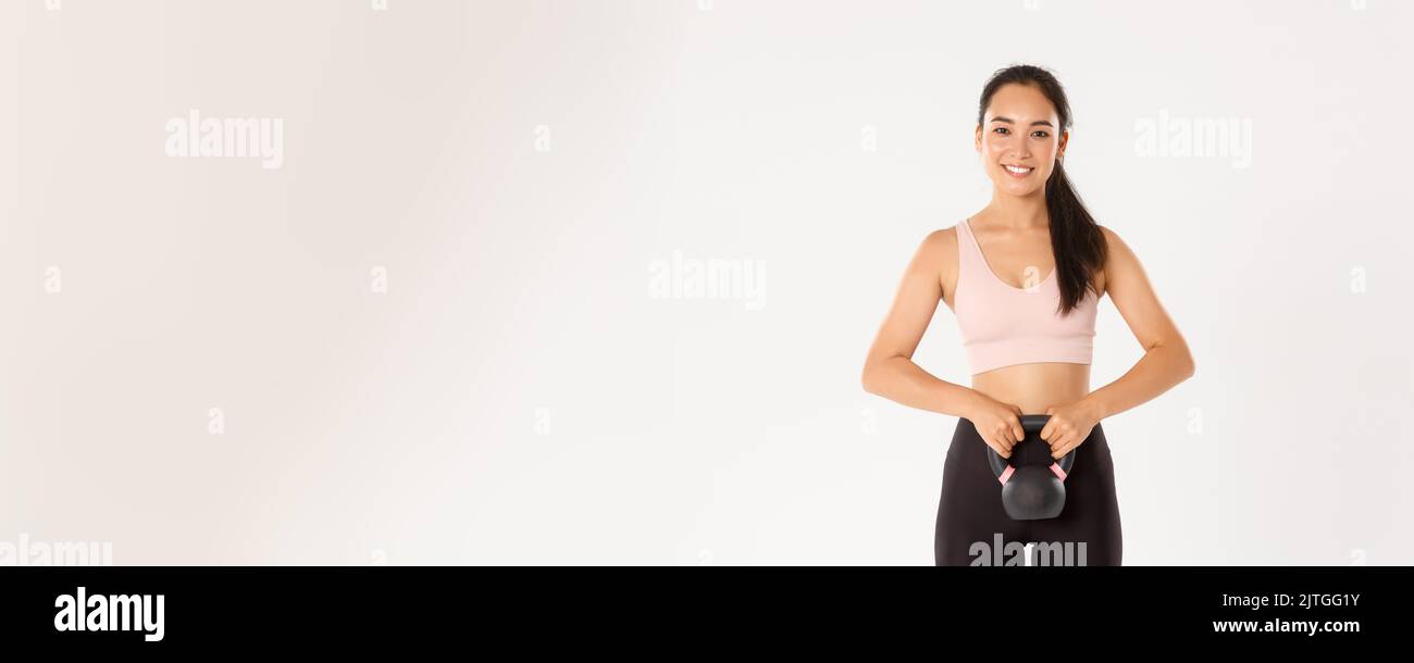 Sport, wellbeing and active lifestyle concept. Smiling strong and slim ...