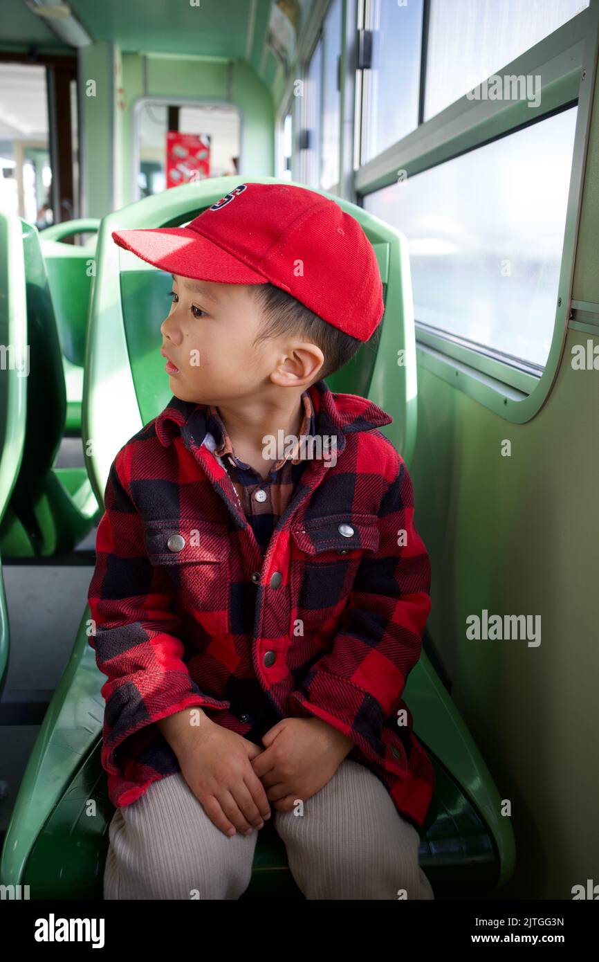 Child on public transport alone hi-res stock photography and images - Alamy