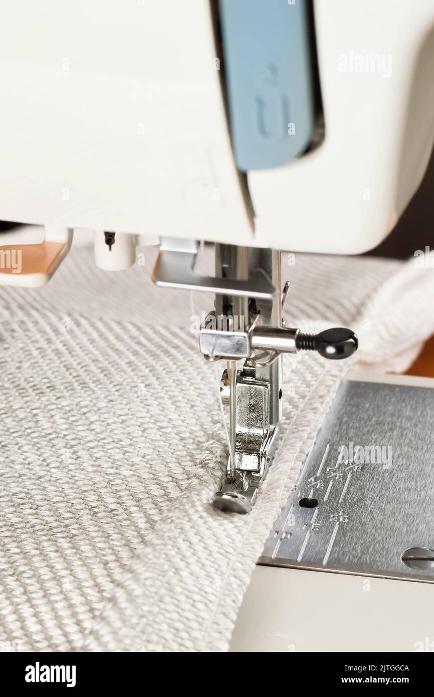 Professional equipment. Modern sewing machine with special pressure ...