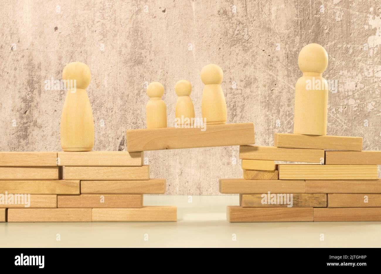 A magnifying glass looks at a child's figure stands between father and ...