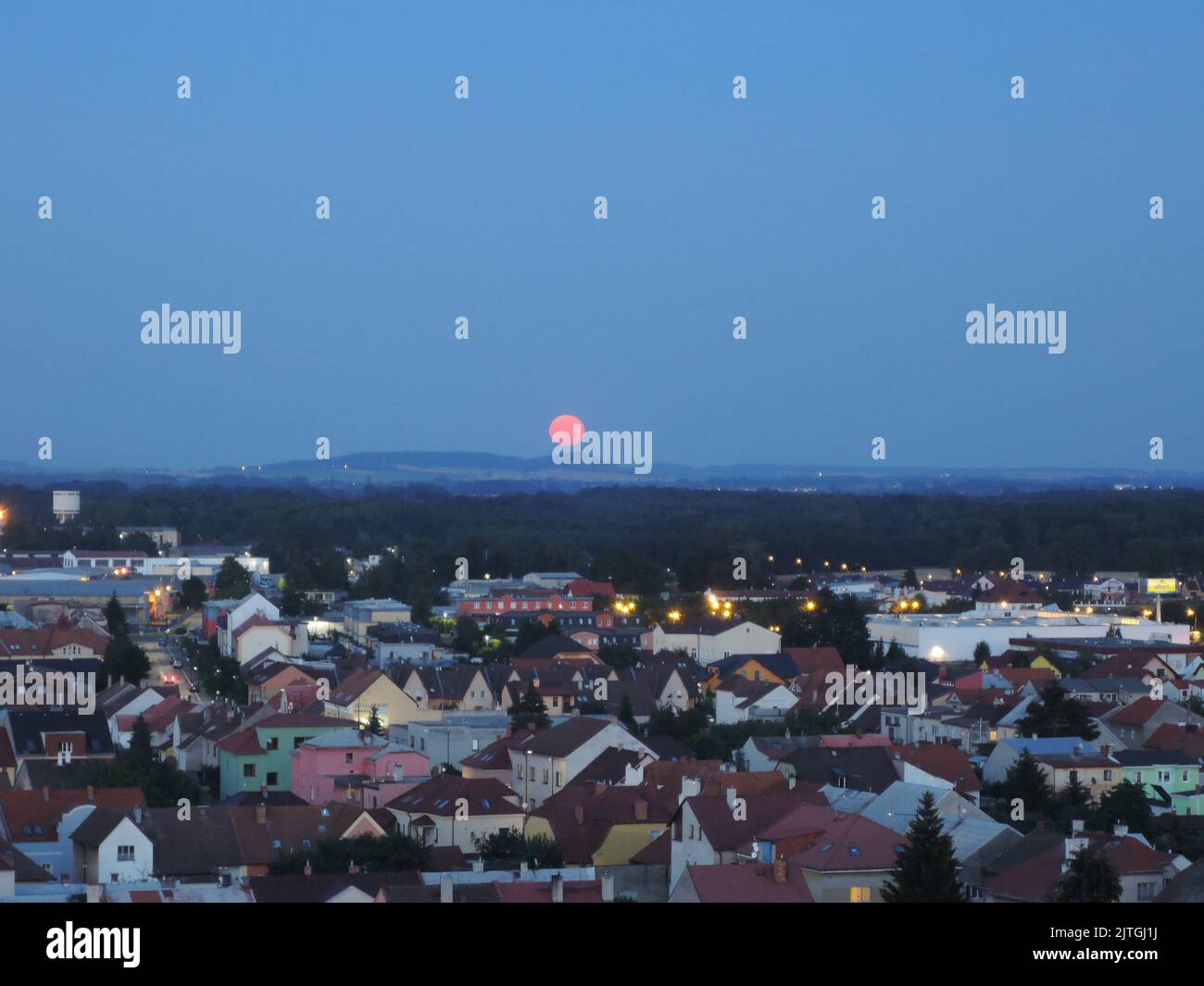 aerial night panorama landscape view of old industrial European town ...