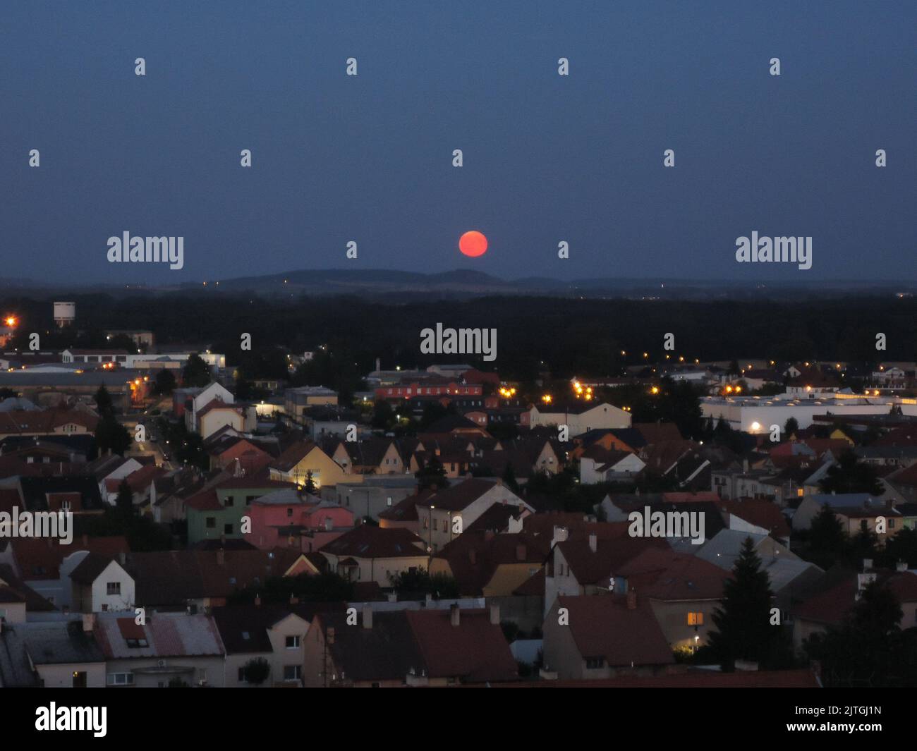 aerial night panorama landscape view of old industrial European town ...
