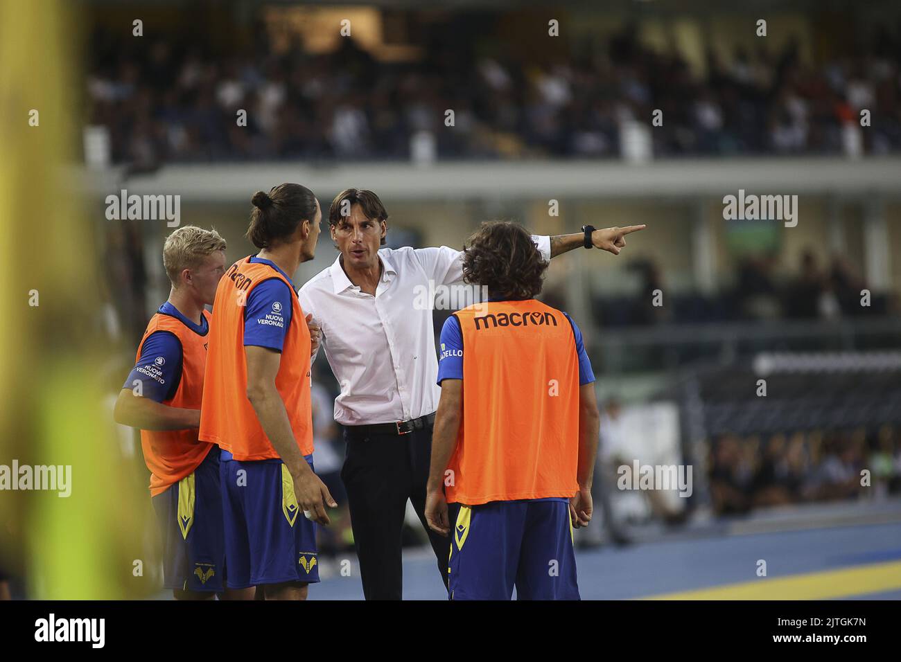 Gabriele Cioffi Head Coach of Hellas Verona FC speaks to Josh Doig of ...