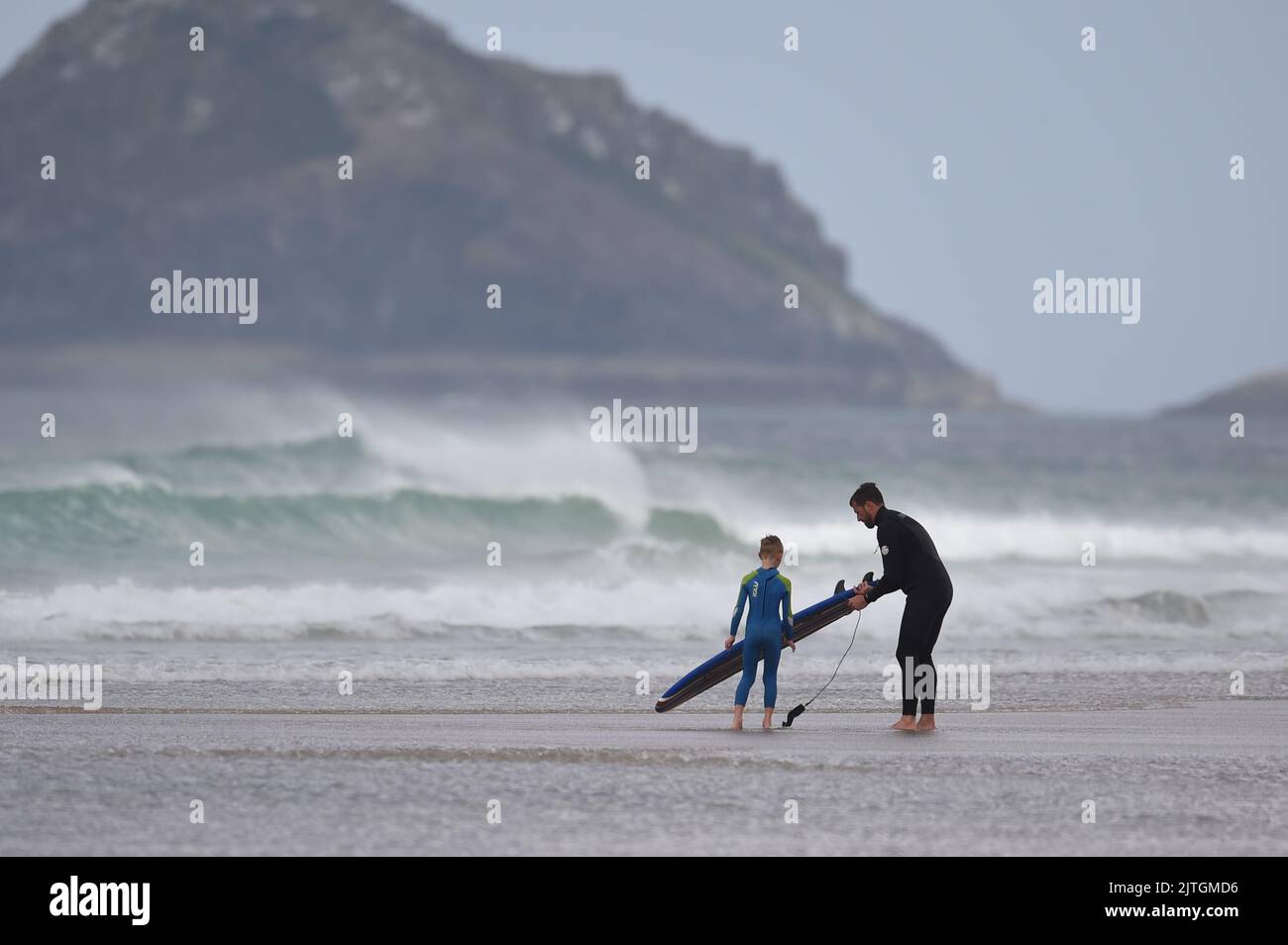 Father and son wetsuits surfing hi-res stock photography and images - Alamy