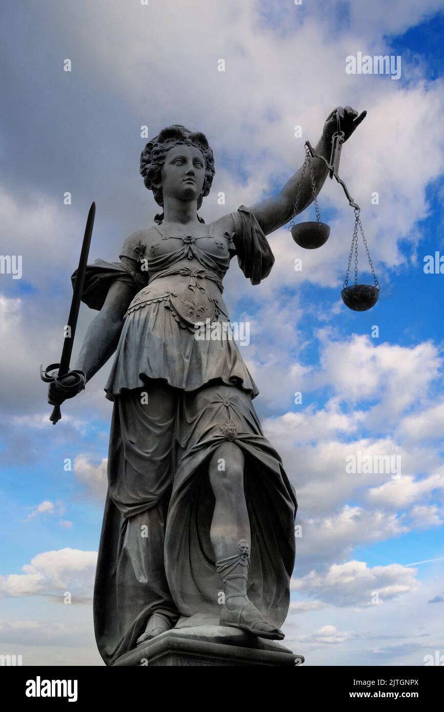 Lady Justice at Gerechtigkeitsbrunnen at Roemerberg at cloudy sky ...