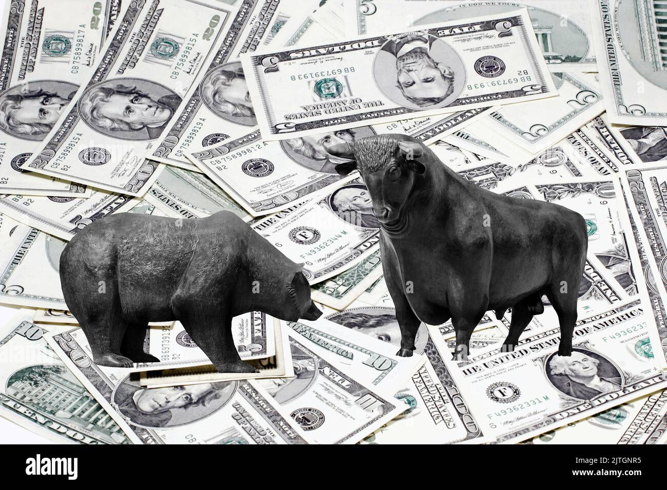 symbolic figure of the stock exchange, bull and bear in front of dollar ...
