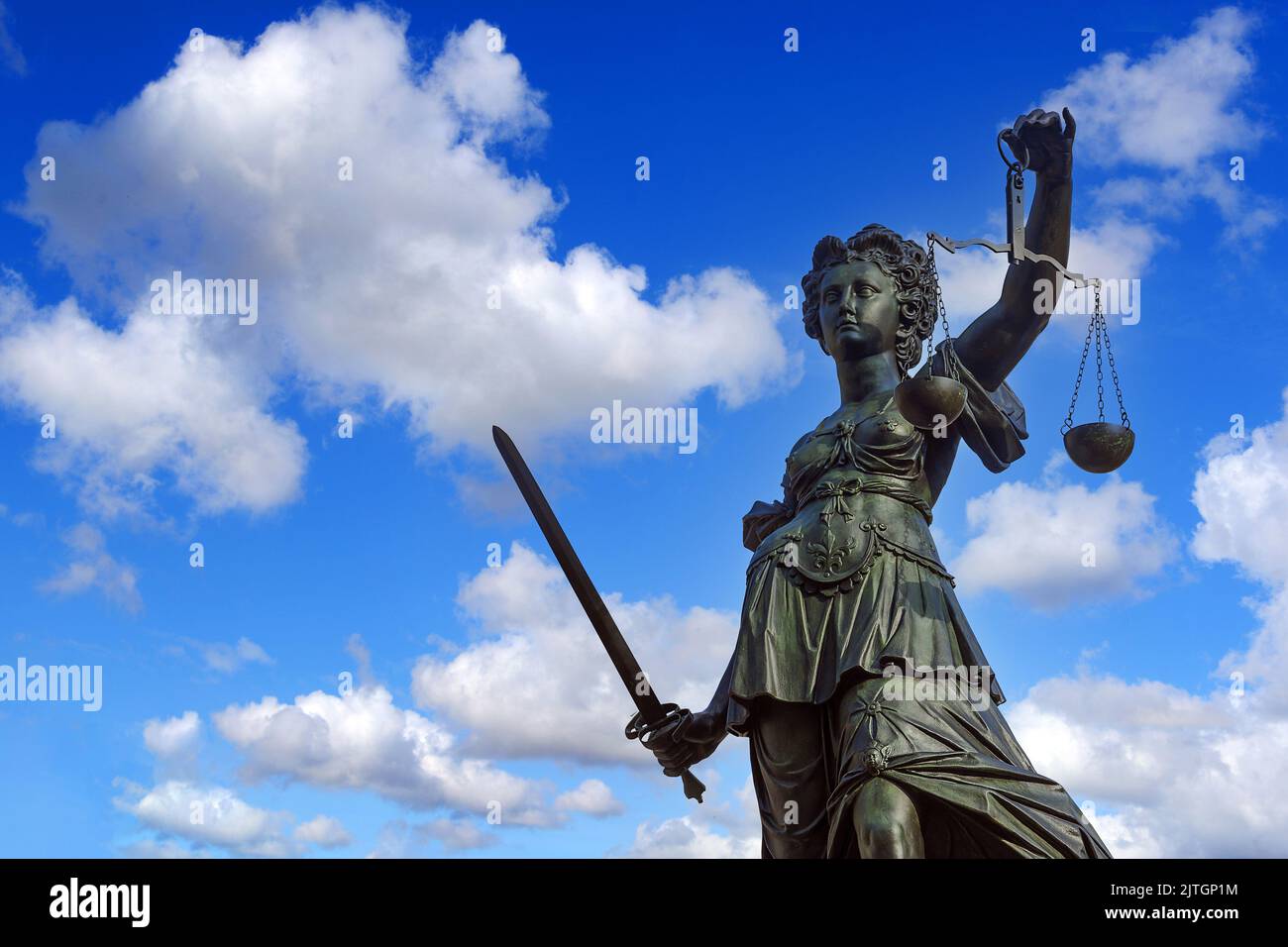 Lady Justice at Gerechtigkeitsbrunnen at Roemerberg at blue cloudy sky ...
