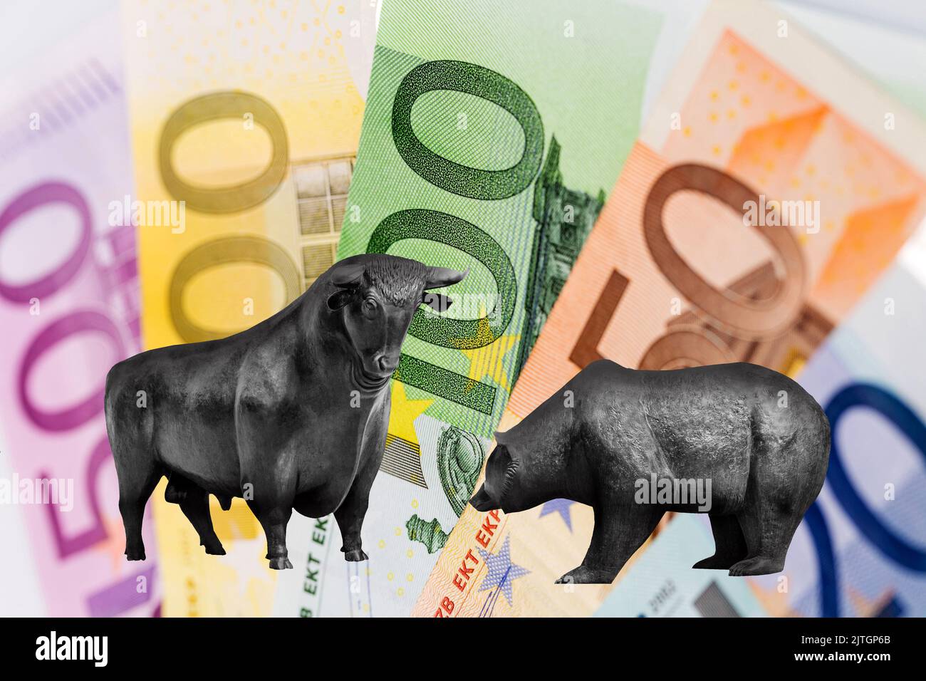 symbolic figures of the stock exchange, bull and bear standing in front ...