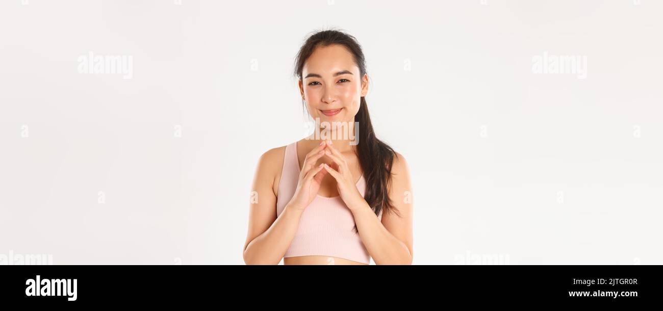 Sport, wellbeing and active lifestyle concept. Portrait of scheming ...