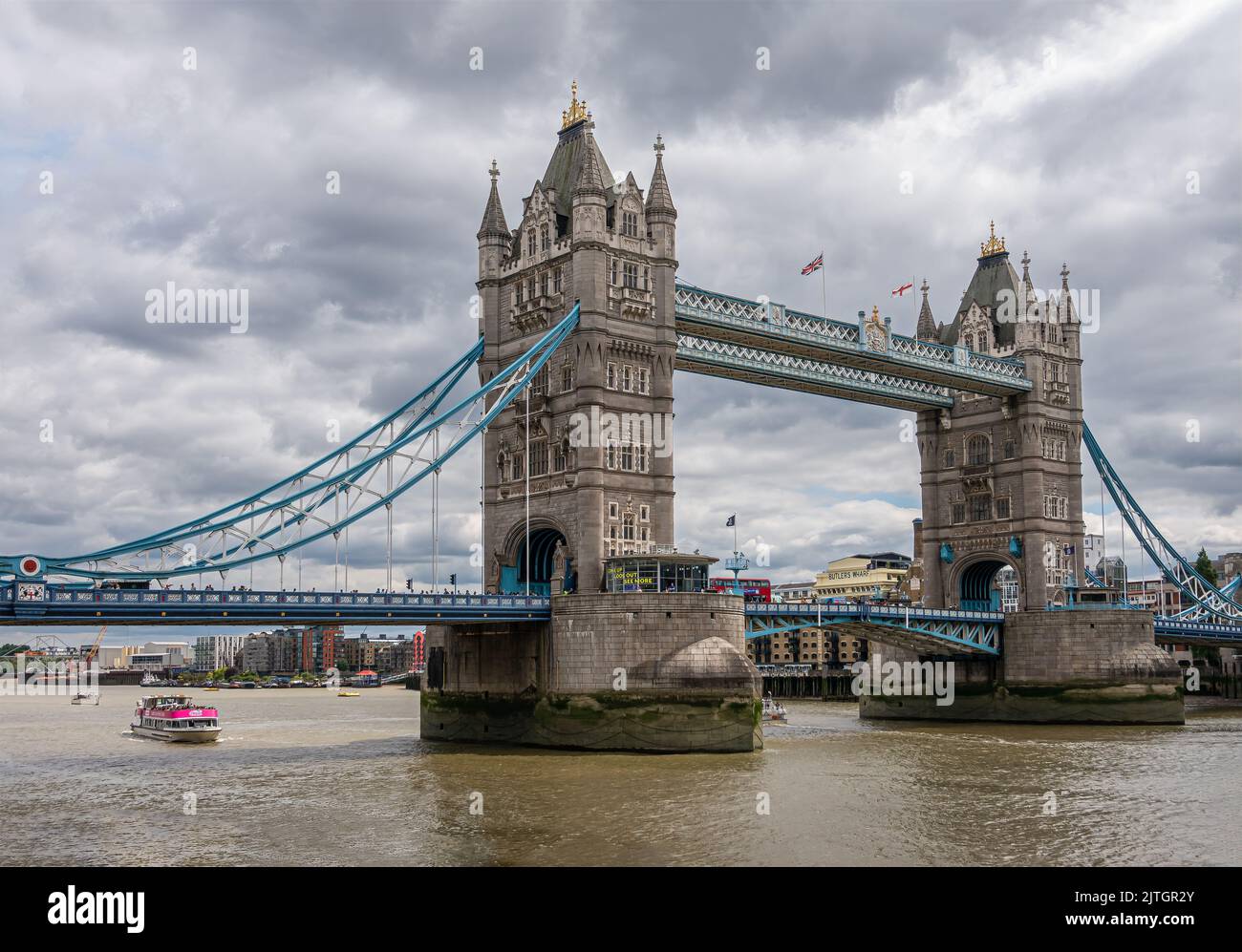 London, England, UK - July 6, 2022: Tower of London quay. Pink ferry ...