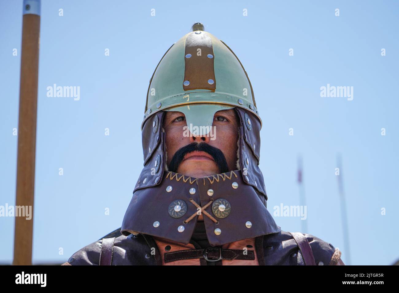 A soldier dressed in old war clothes representing the former Turkish ...