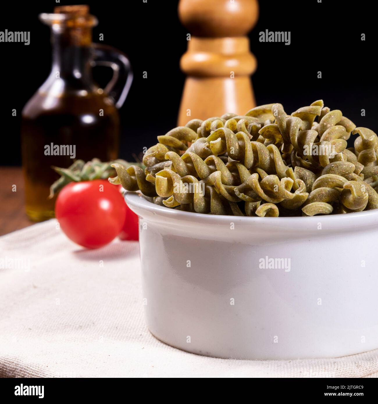 Raw spinach screw noodles, vegetarian, vegan . Healthy food Stock Photo ...