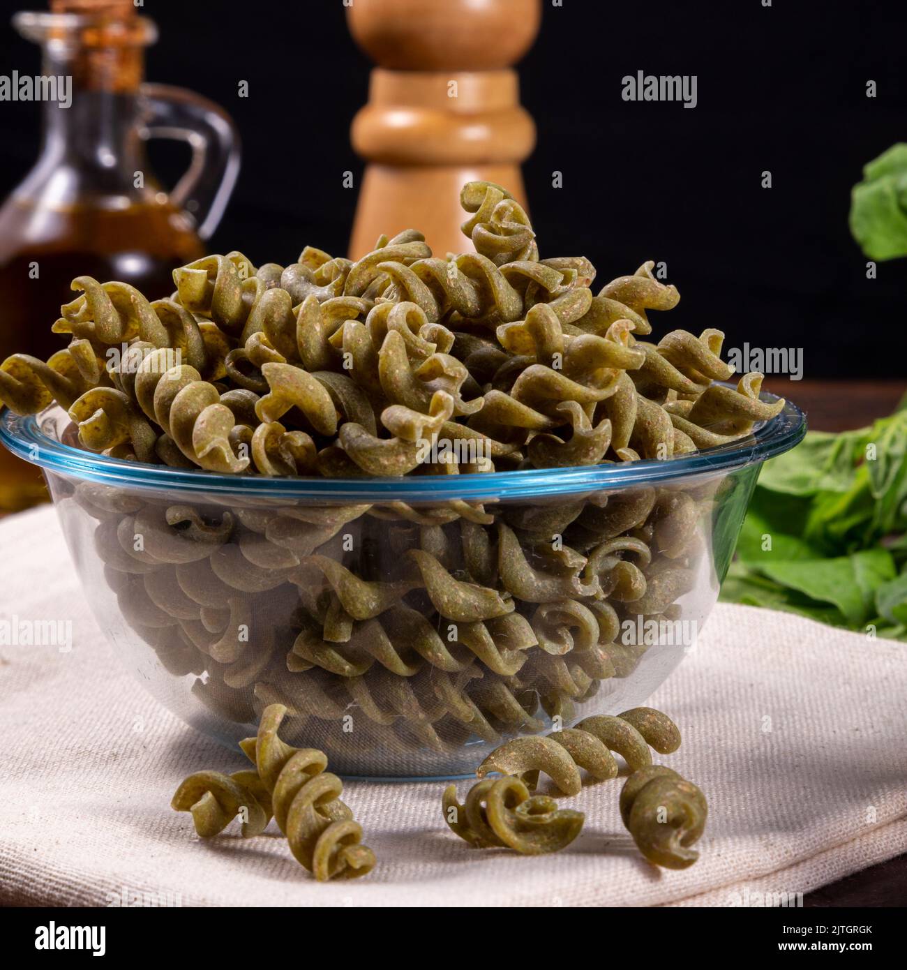 Raw spinach screw noodles, vegetarian, vegan . Healthy food Stock Photo ...