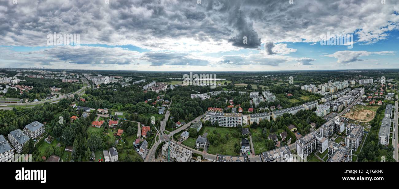 An aerial view of a cityscape under a cloudy sky Stock Photo - Alamy