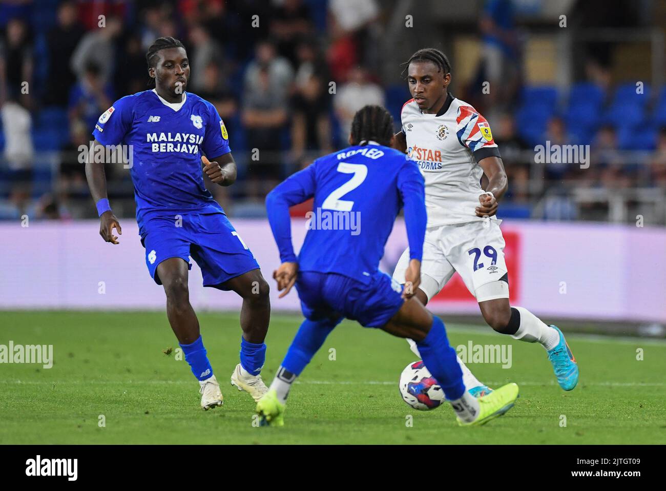 AmariÕi Bell #29 of Luton Town takes on Mahlon Romeo #2 of Cardiff City ...