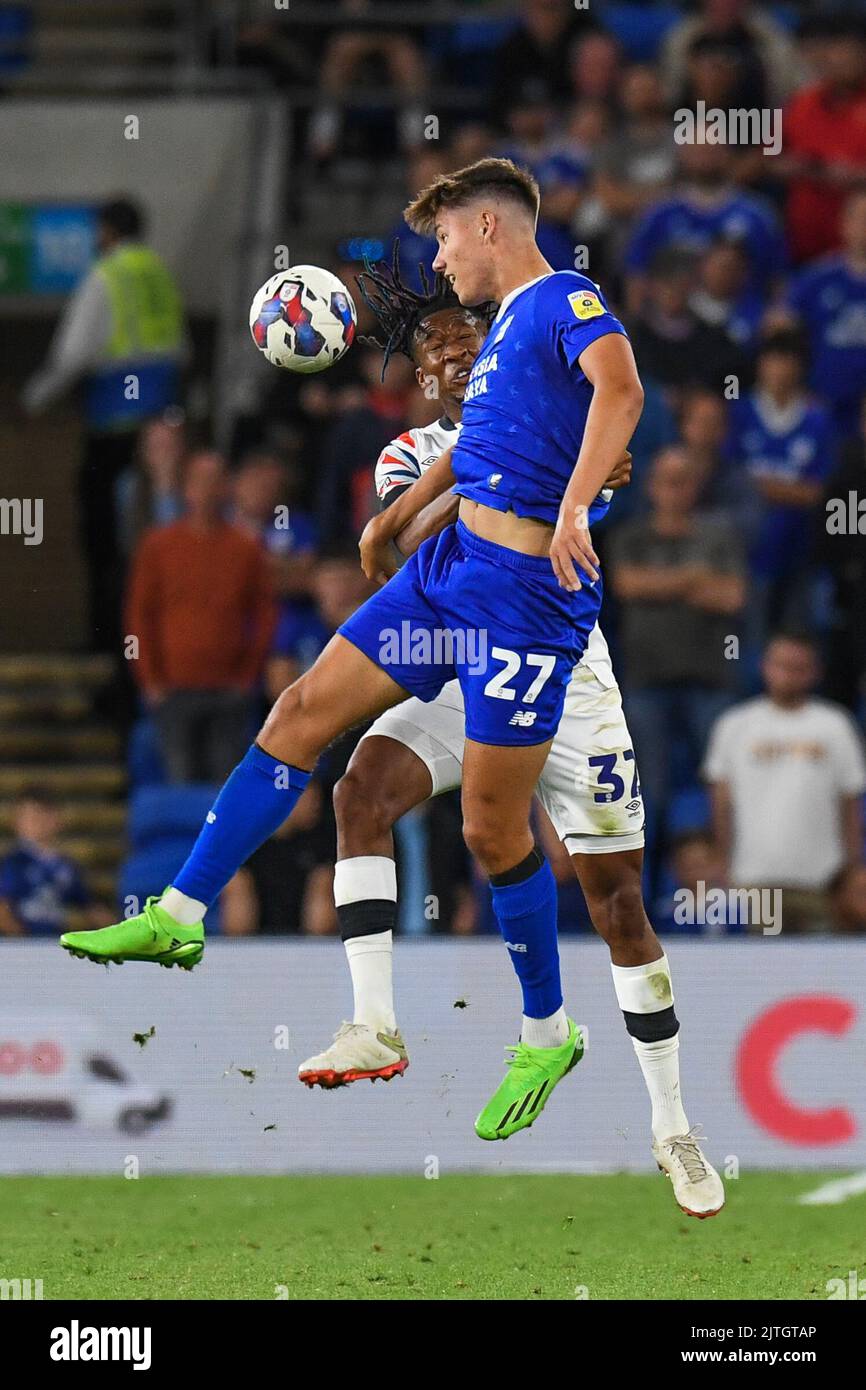 Rubin Colwill #27 of Cardiff City wind the high ball Stock Photo - Alamy