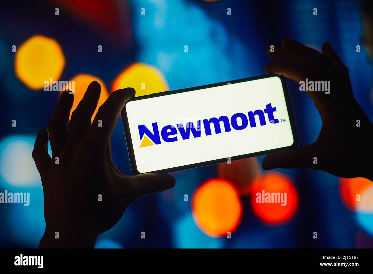 In this photo illustration, the Newmont Corporation logo is displayed ...