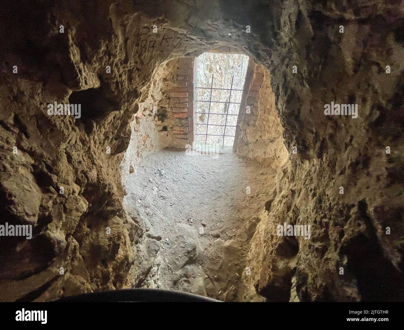 A cave interior with a fence Stock Photo - Alamy