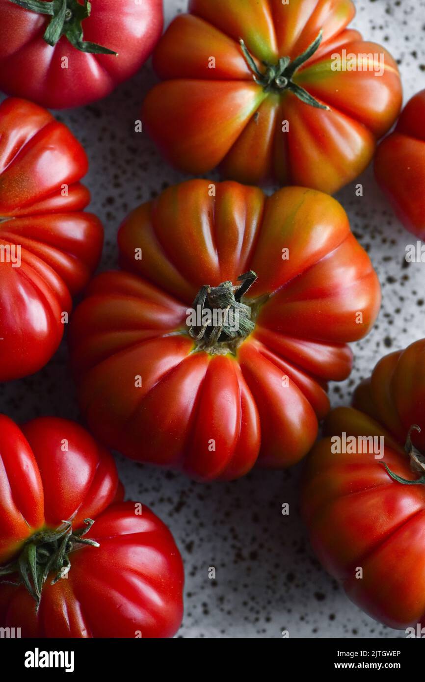 Vibrant Red Heirloom Tomato Close Up Stock Photo - Alamy