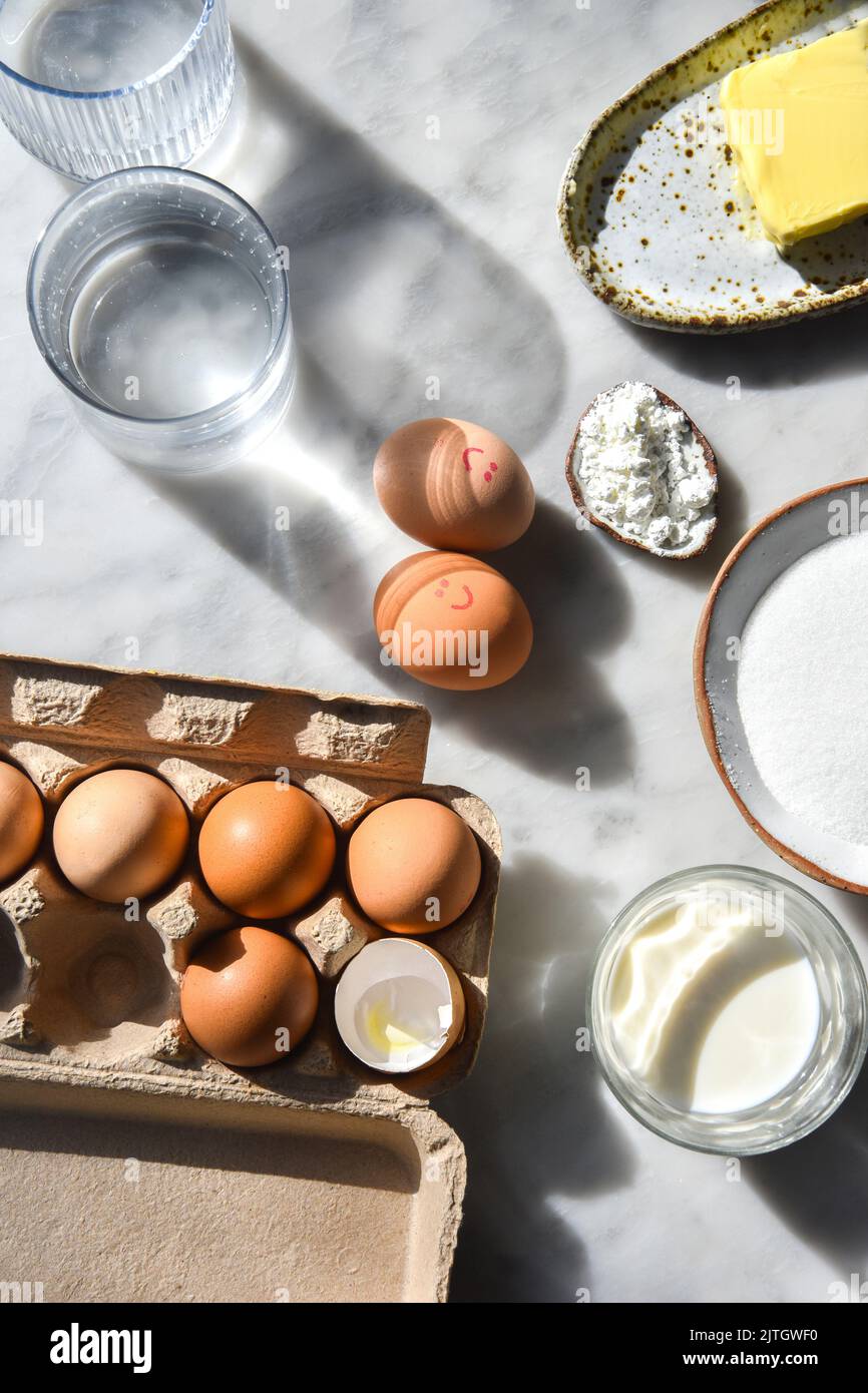 Baking Ingredients in Sunlight, including eggs, flour, sugar and butter ...