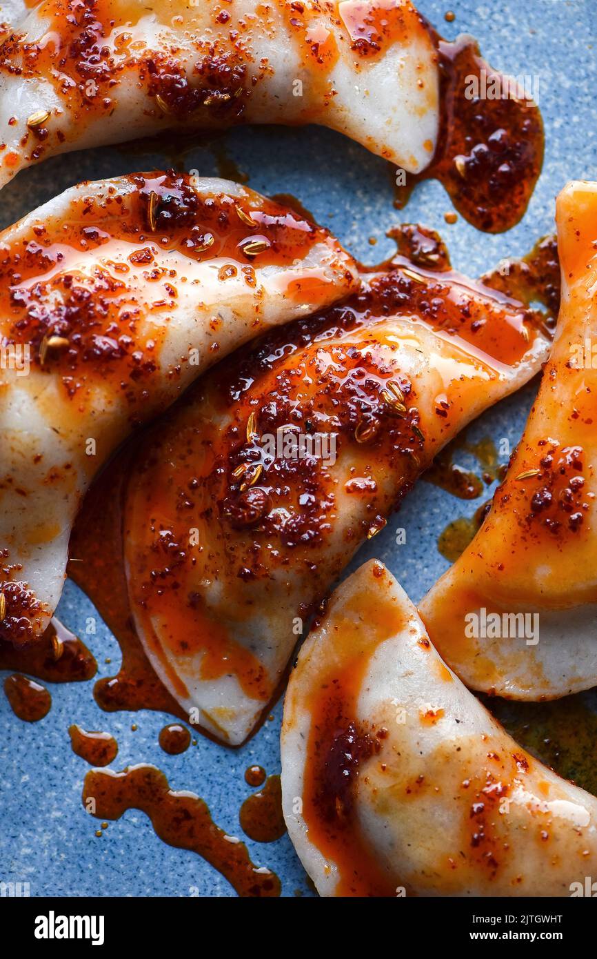 Stuffed Dumplings with Chilli Oil Stock Photo - Alamy