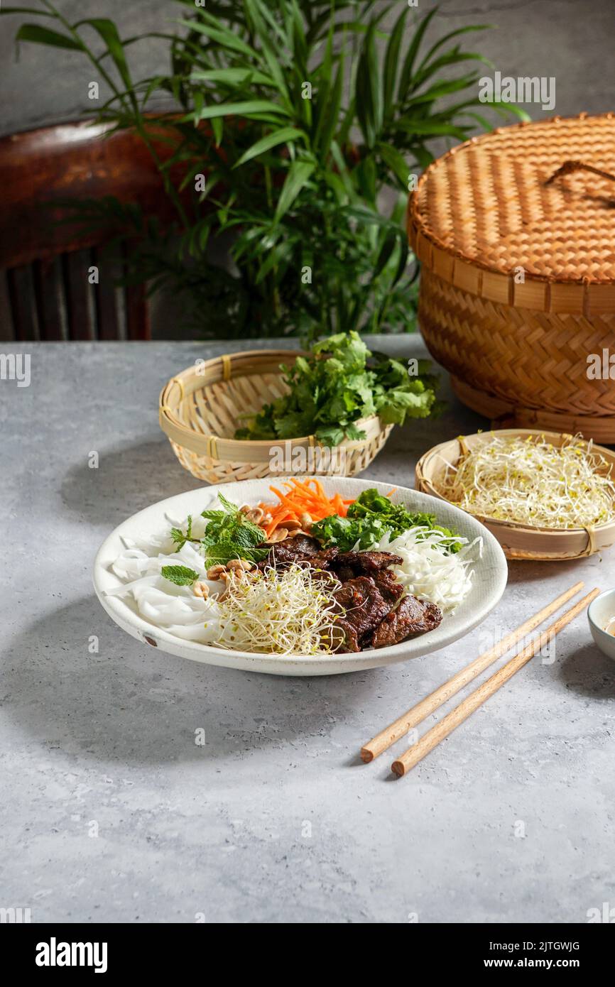 traditional Vietnamese noodle salad - Bun Bo Nam Bo, with beef, rice ...