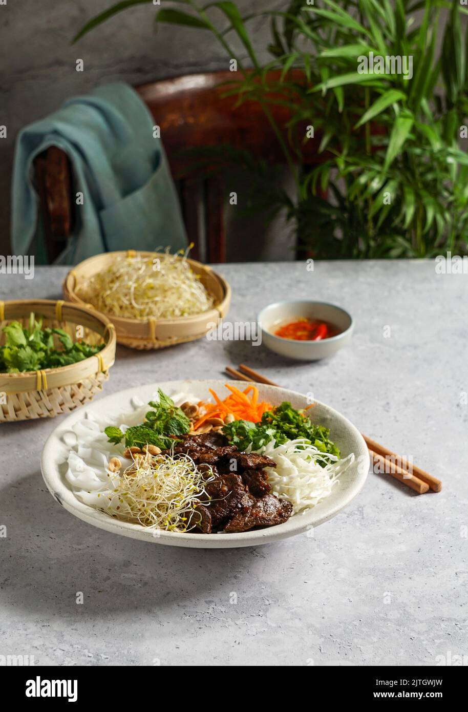 traditional Vietnamese noodle salad - Bun Bo Nam Bo, with beef, rice ...