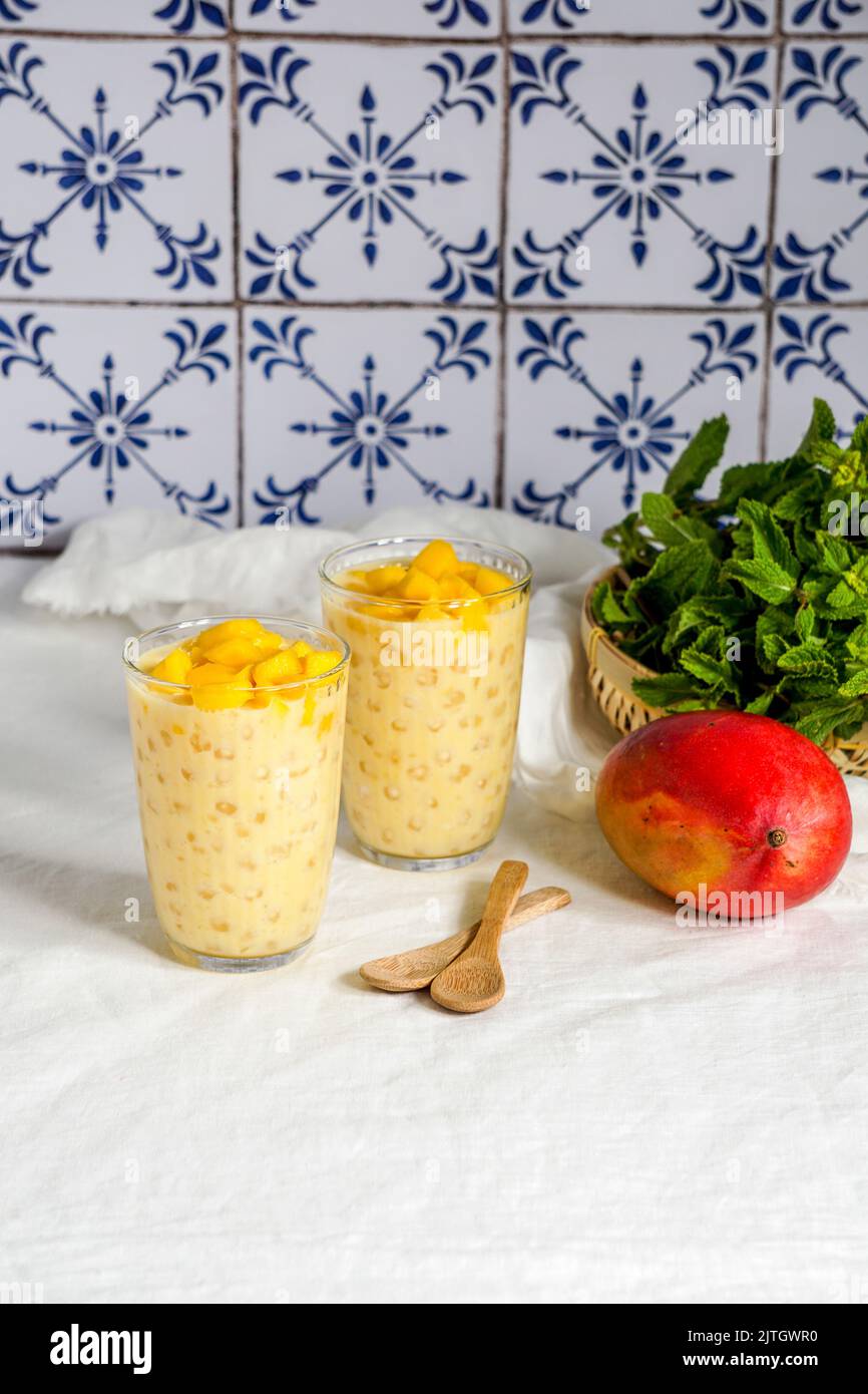 Thai coconut mango sago pudding - tapioca pudding Stock Photo - Alamy