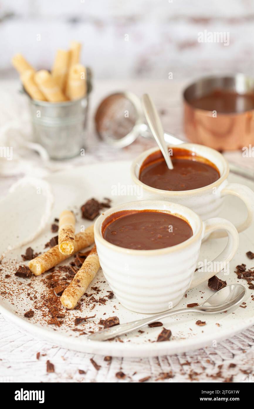 Italian style thick hot chocolate (cioccolata calda) in espresso cups ...