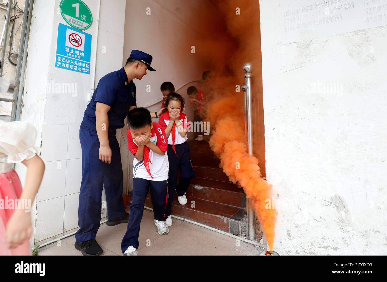ZIXING, CHINA - AUGUST 30, 2022 - Primary school students are guided by ...