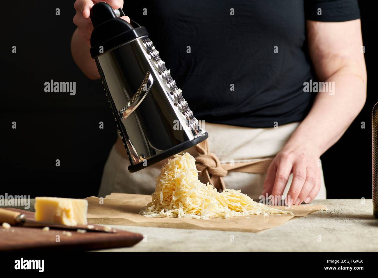 Hands grating hi-res stock photography and images - Alamy