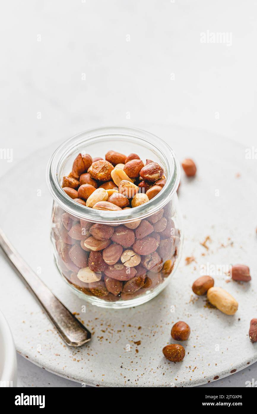 Roasted Peanuts served in a jar Stock Photo - Alamy
