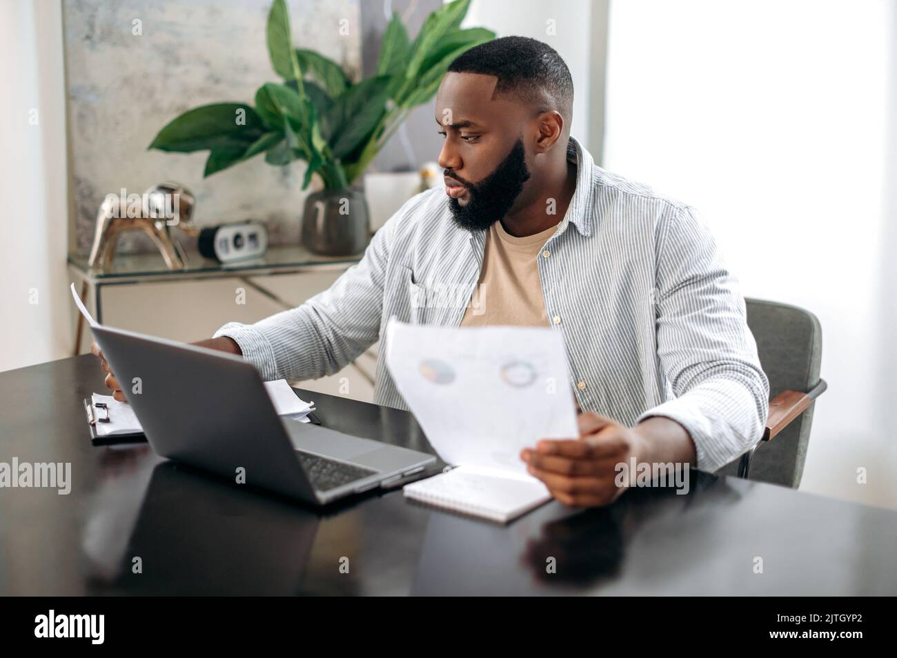 Male executive manager works graphs hi-res stock photography and images ...